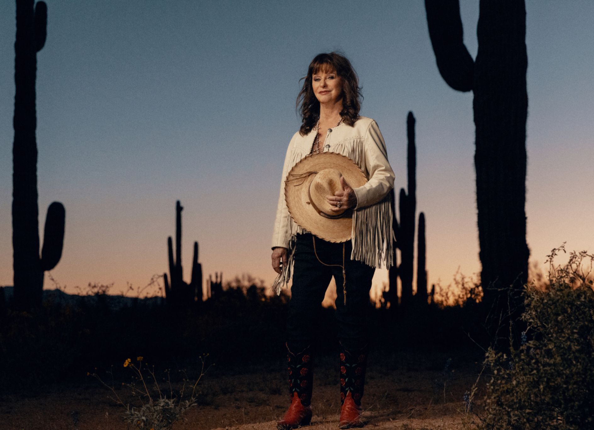 At 80, Jessi Colter sits by the window of their old Arizona home, the ...